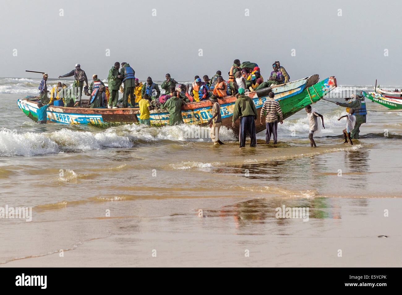 Landing, Local Fishermen, Pirogues fishing boats, Kayar, Senegal Stock ...