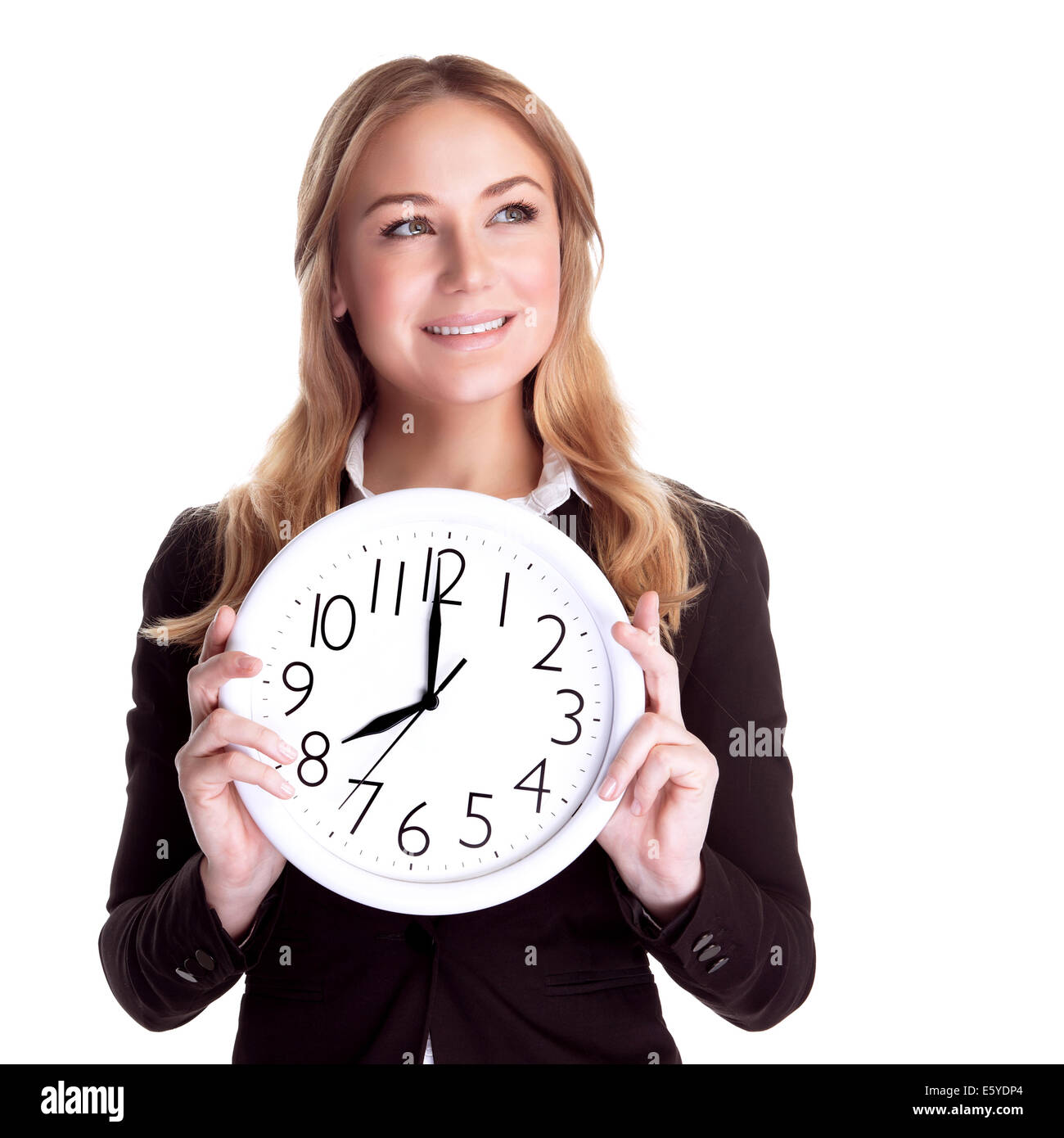 Portrait of happy smiling business woman holding in hands big clock ...