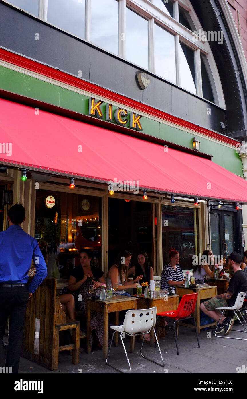 people siting outside drinking at KICK bar in Shoreditch, London Stock ...