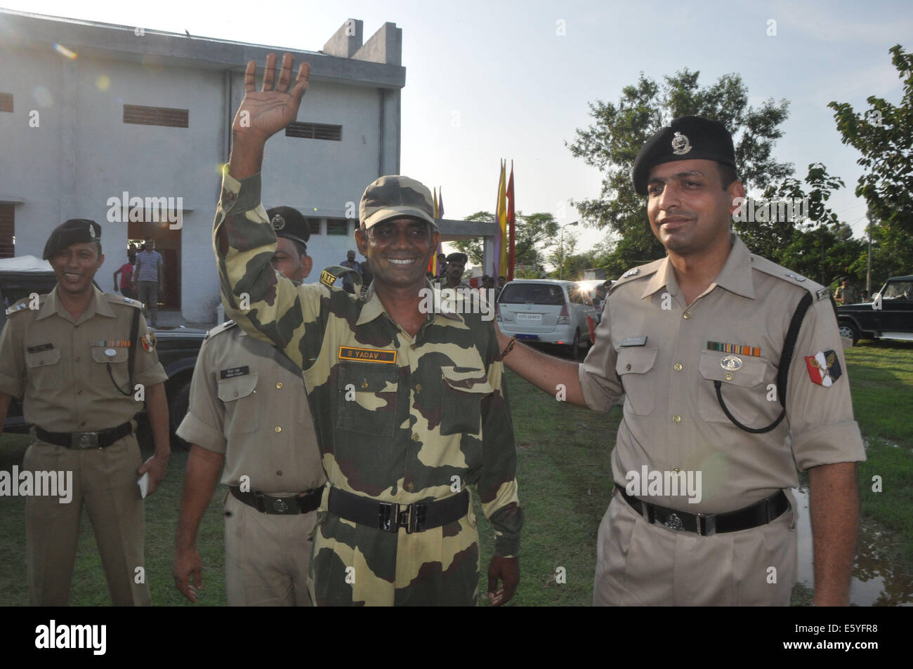 Released Indian border guard Satyasheel Yadav (C) waves to his ...