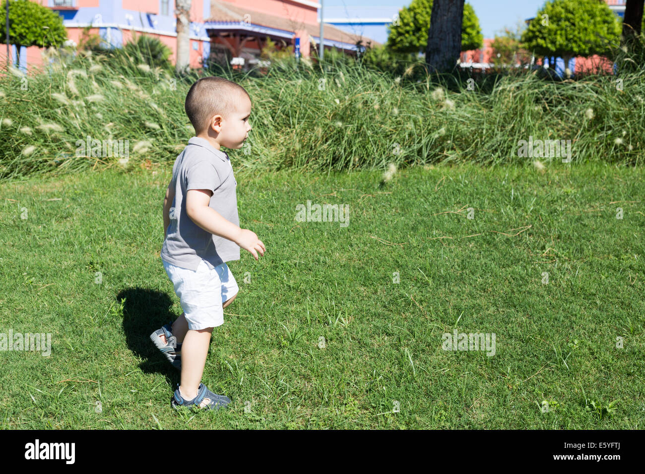 Child walking side view hi-res stock photography and images - Alamy