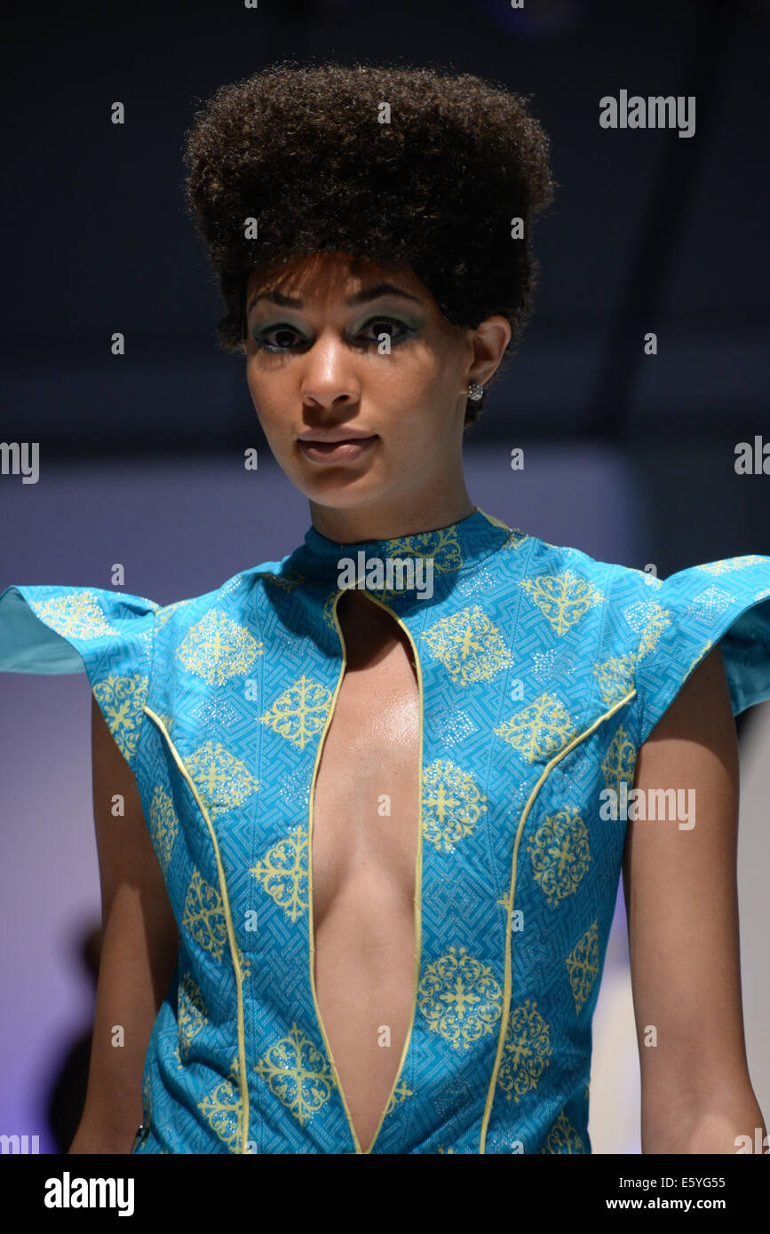 London, UK. 8th August, 2014. Model wearing TIR Fashion House latest ...