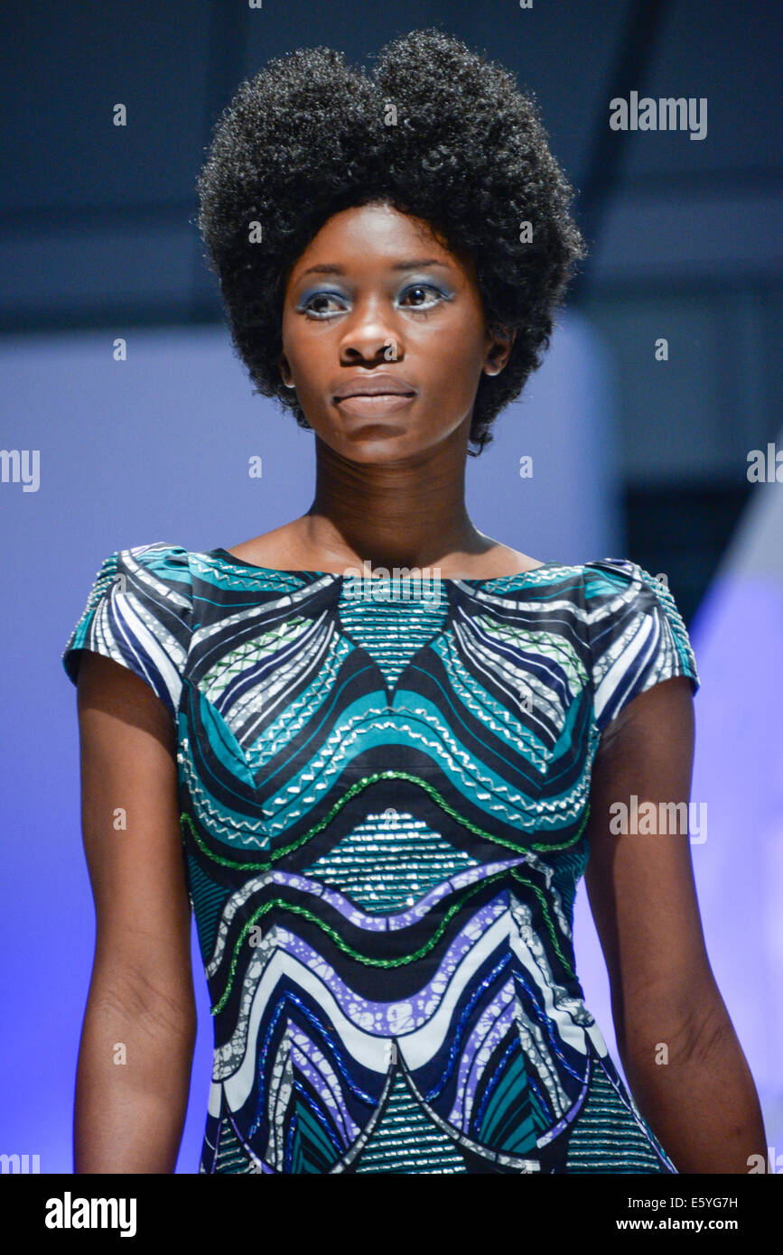 London, UK. 8th August, 2014. Model wearing Needle Point latest ...