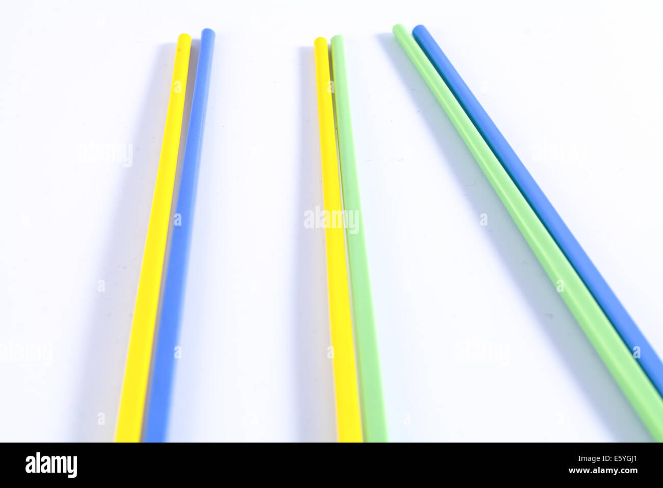 Colorful chopsticks on the white background Stock Photo - Alamy