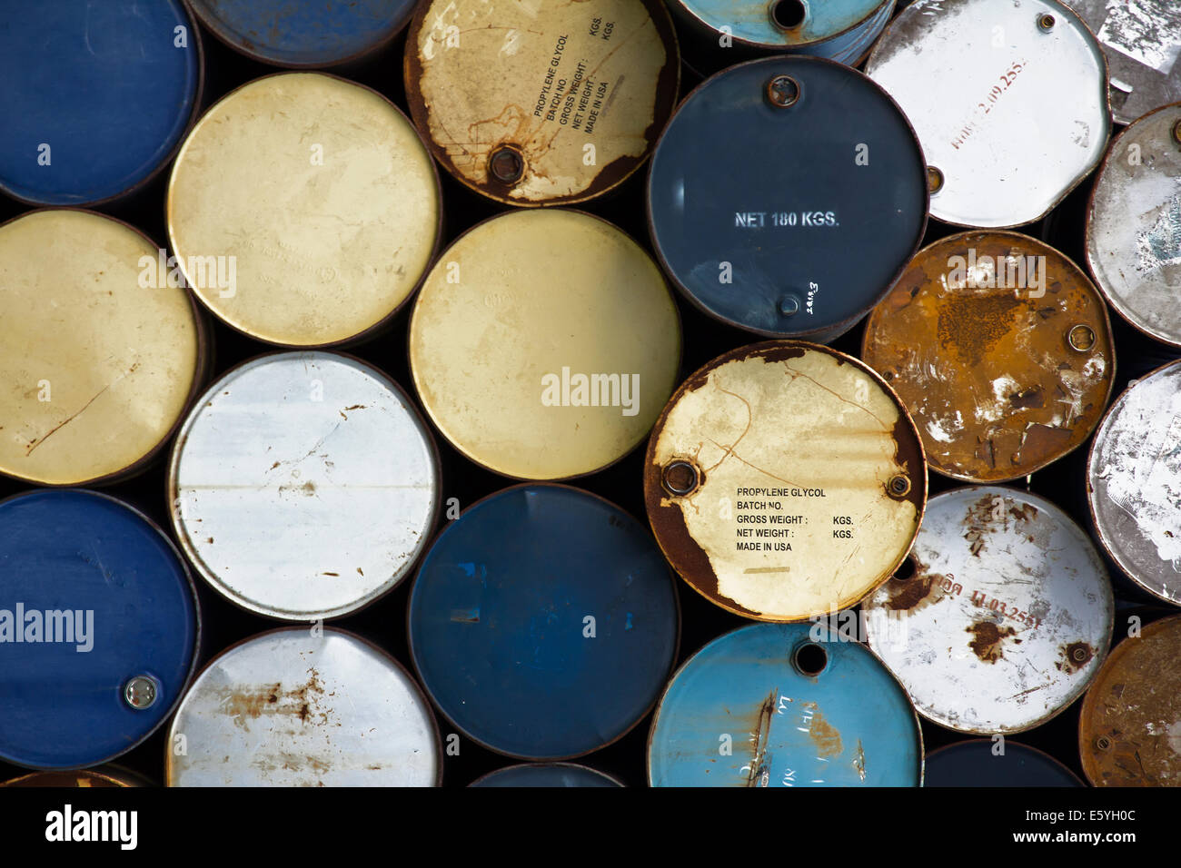 stack of old fuel tanks background Stock Photo - Alamy