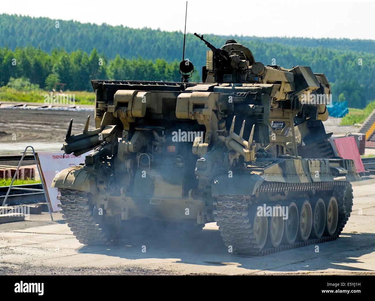 Engineering military vehicle to repair destroying structure Stock Photo ...