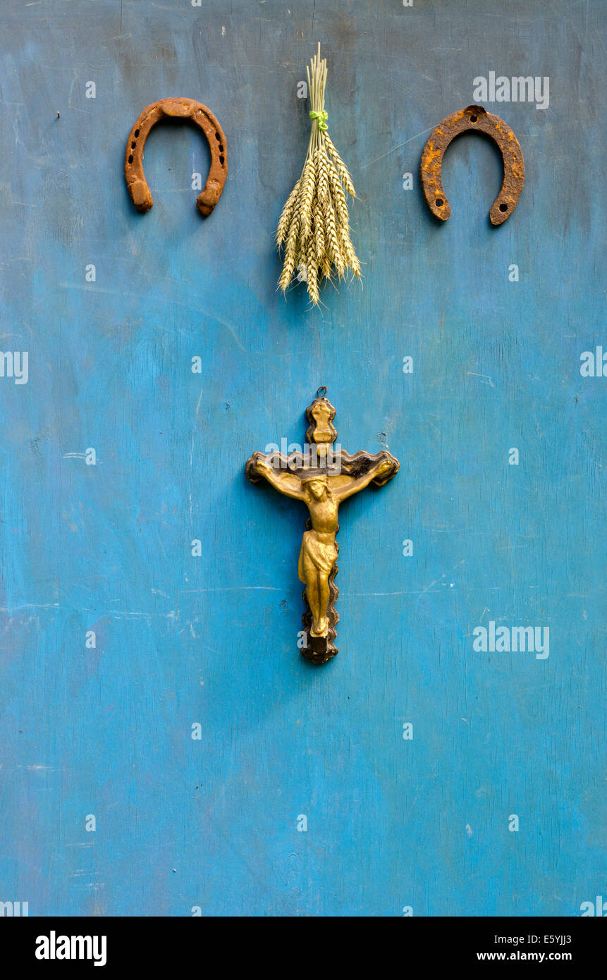 Concept Suffering of Jesus Christ, rusty horseshoe and wheat ears bunch ...