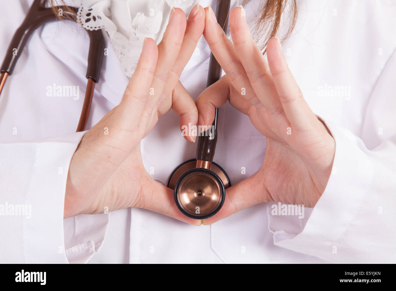 Close up of doctor's hands making heart shape with stethoscope Stock ...