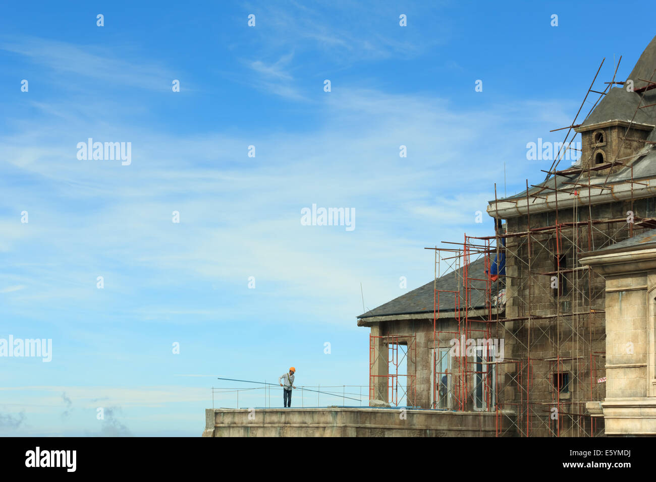 Workers are build towers Stock Photo - Alamy