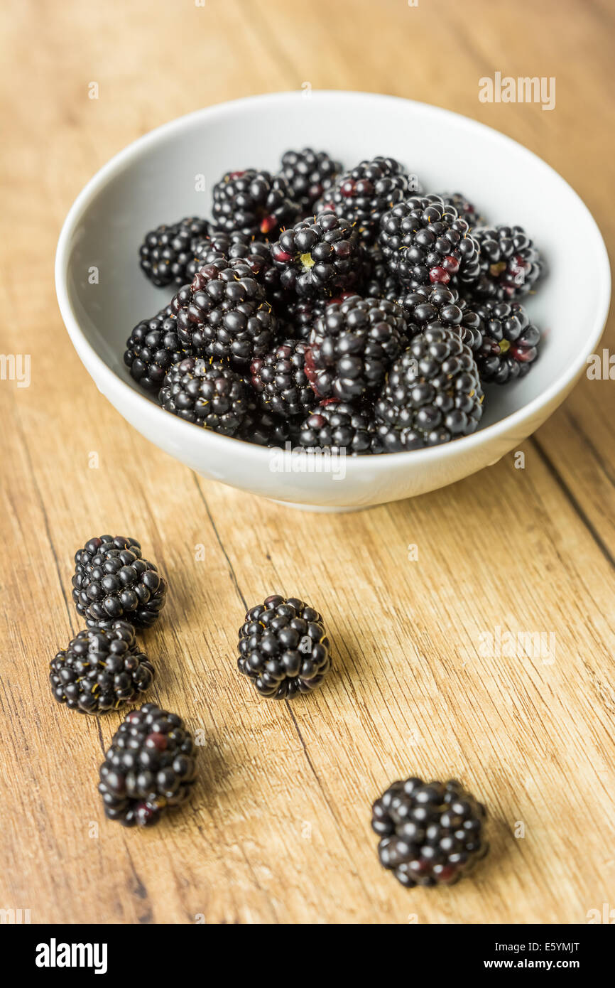 Fresh Blackberry Fruits In White Bowl Stock Photo - Alamy