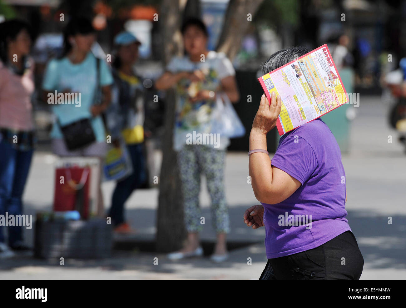 Yinchuan, China's Ningxia Hui Autonomous Region. 9th Aug, 2014. A woman ...