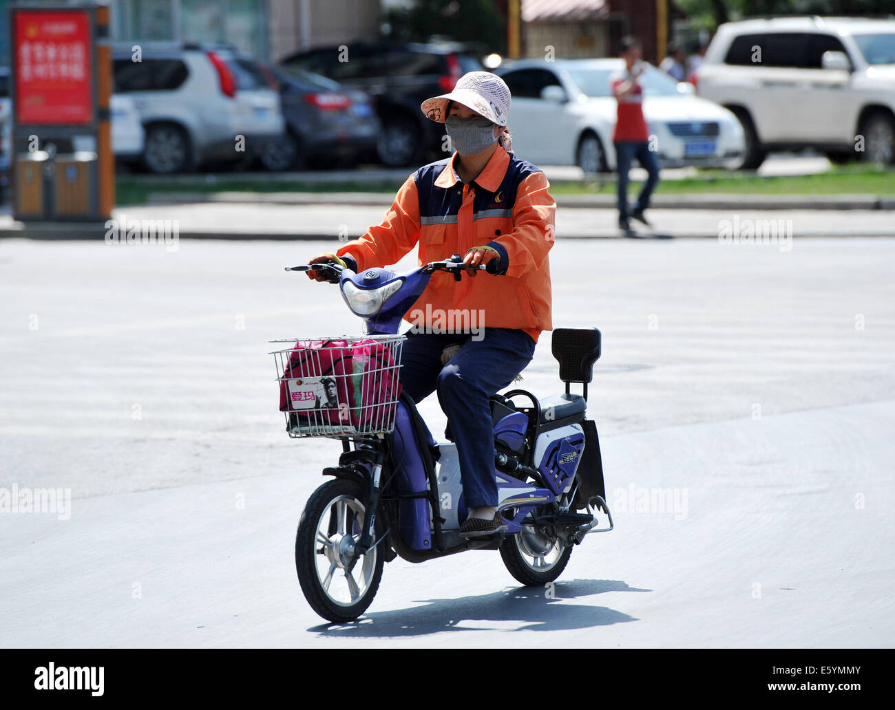 Yinchuan, China's Ningxia Hui Autonomous Region. 9th Aug, 2014. A woman ...