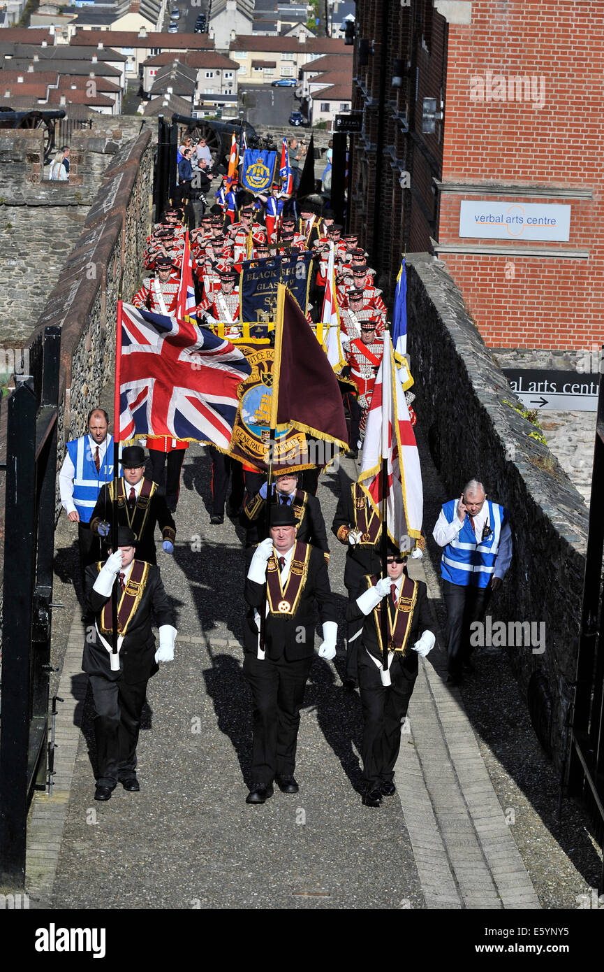 Bands marching in orange parade hi-res stock photography and images - Alamy