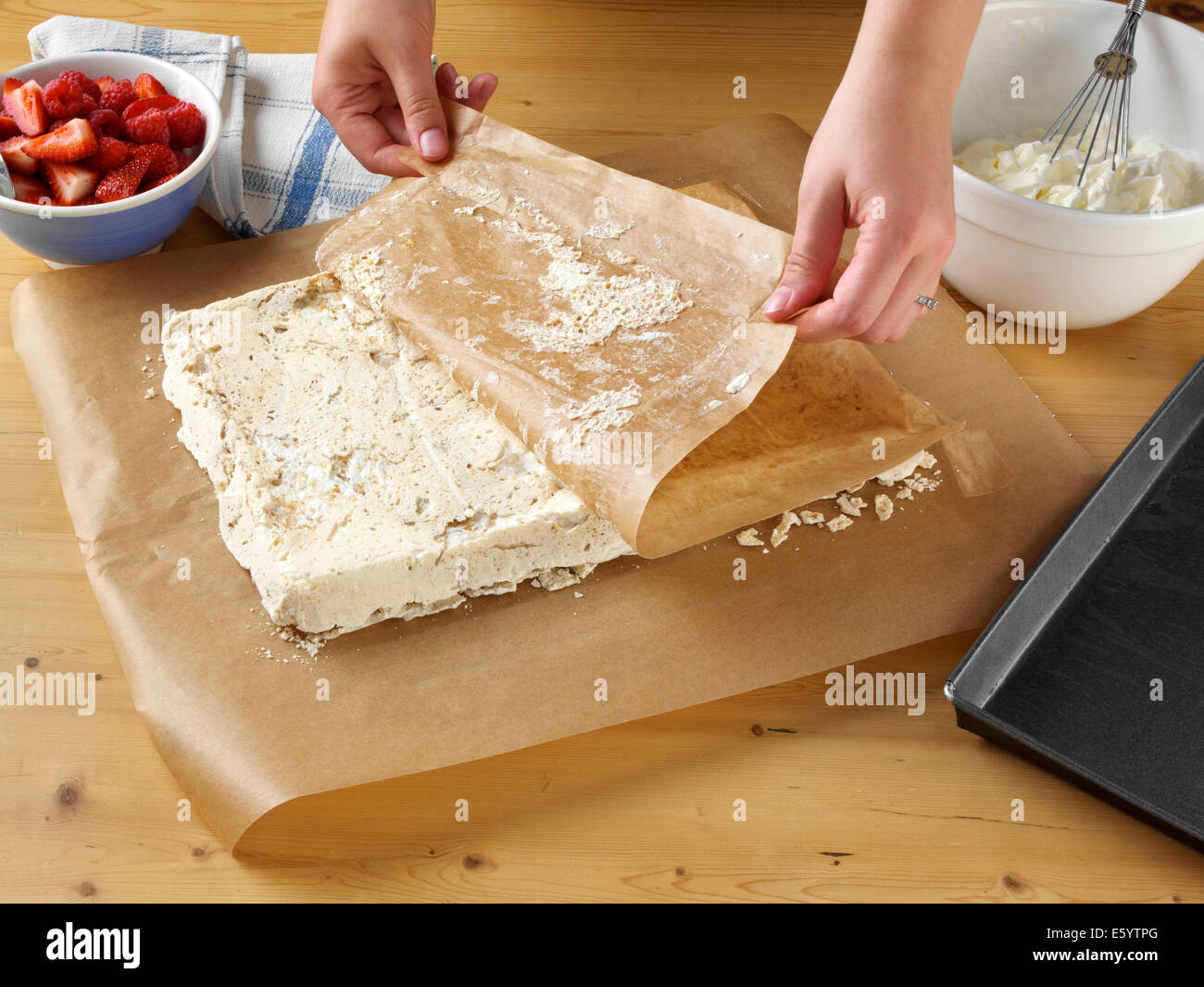 Peeling paper off cream layer hi-res stock photography and images - Alamy