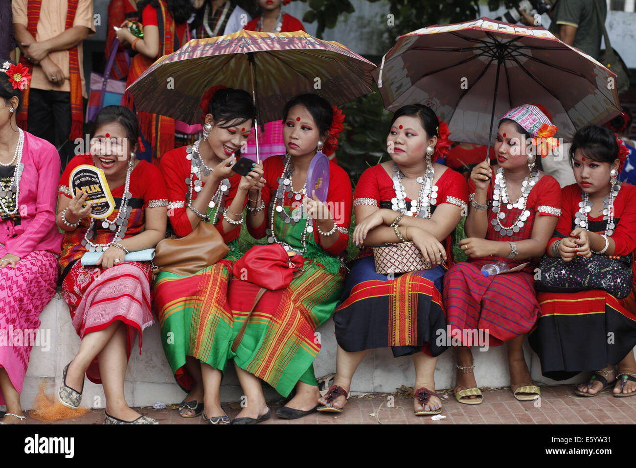 Dhaka, Bangladesh. 9th Aug, 2014. Indigenous Bangladeshi women sit on a ...