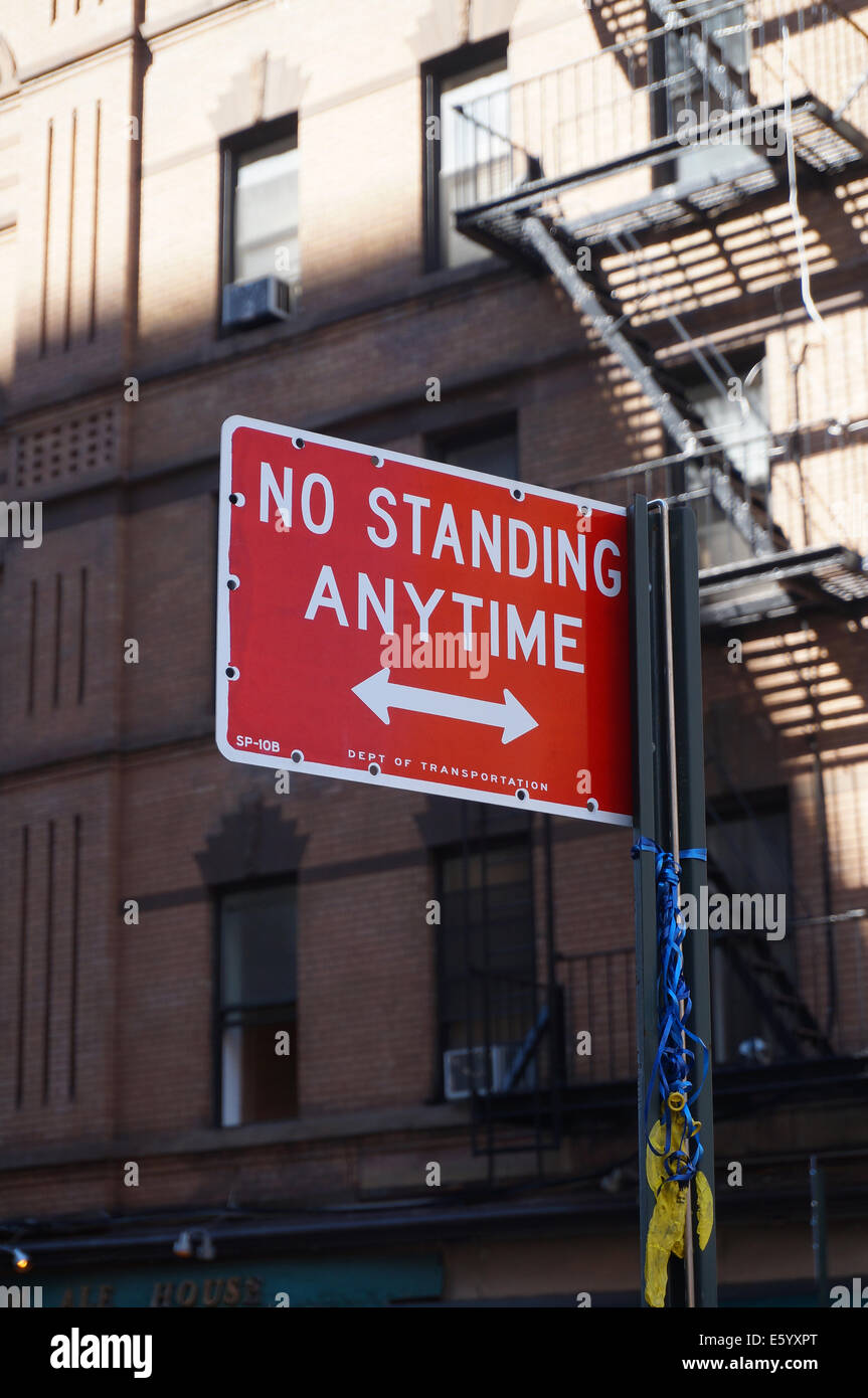 Red Sign saying "No Standing Anytime Stock Photo - Alamy