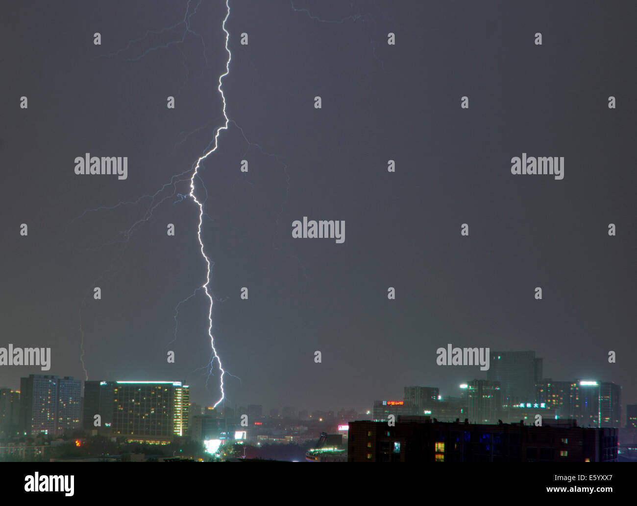 The sky is engulfed in lightning flashes and bolts criss-crossing the ...