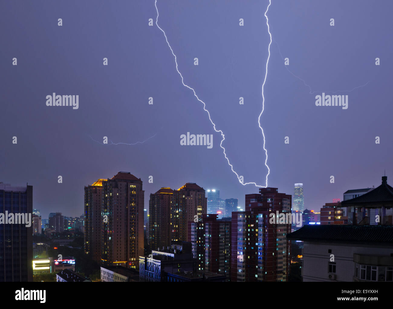 The sky is engulfed in lightning flashes and bolts criss-crossing the ...