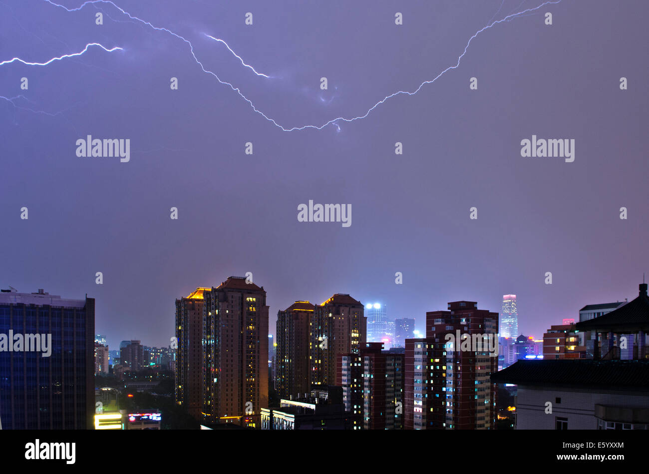 The sky is engulfed in lightning flashes and bolts criss-crossing the ...