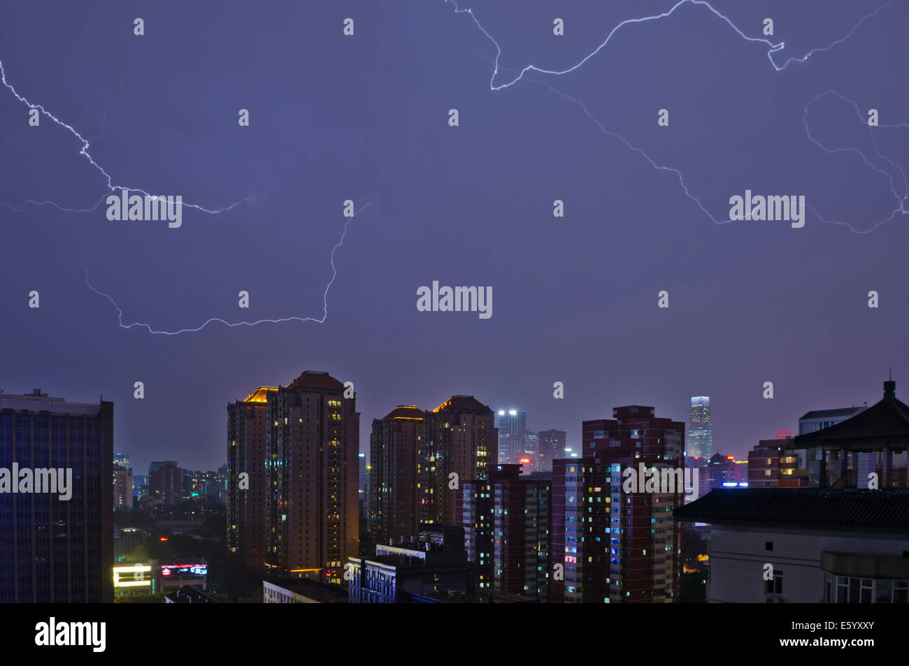 The sky is engulfed in lightning flashes and bolts criss-crossing the ...