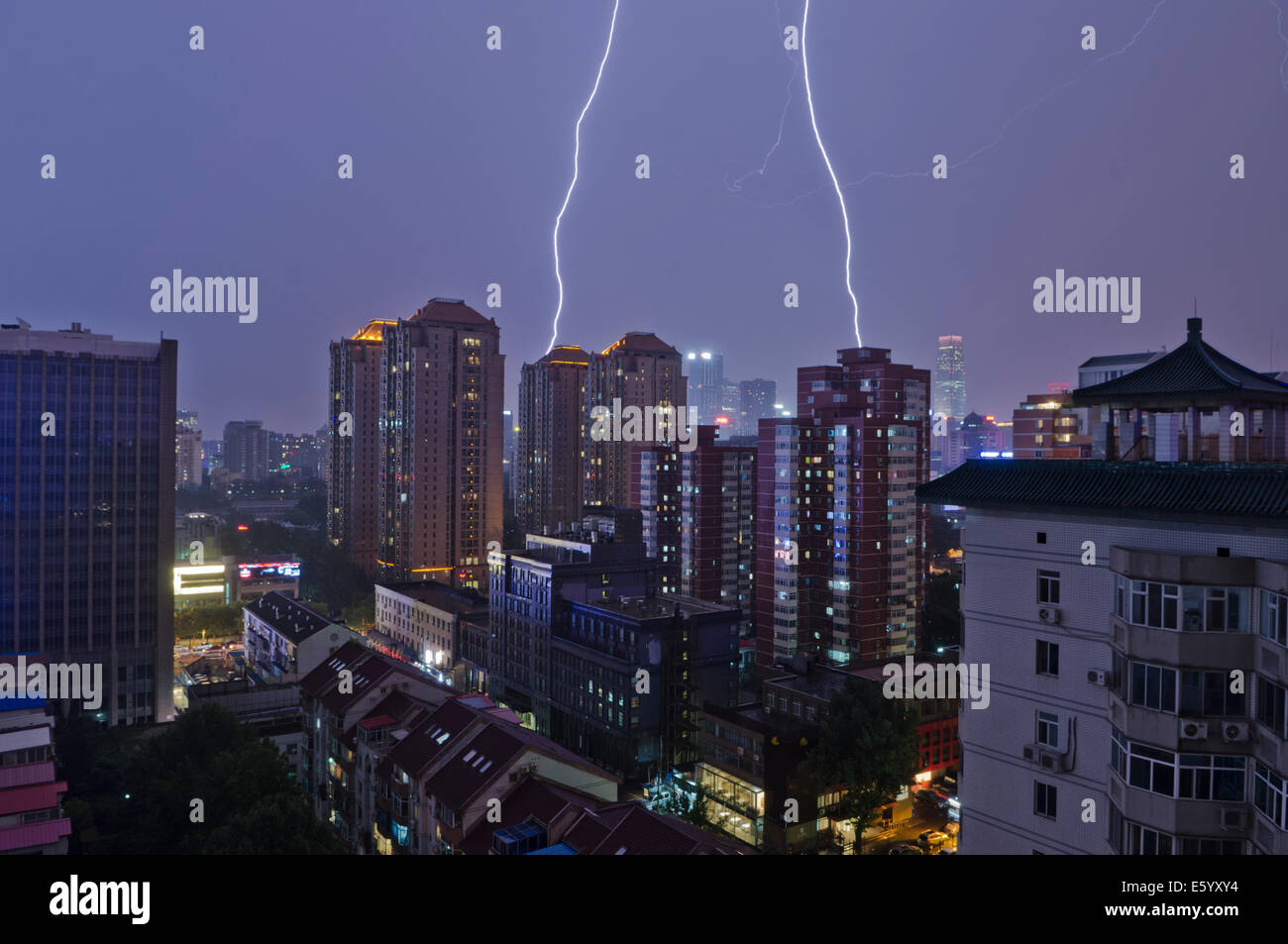 The sky is engulfed in lightning flashes and bolts criss-crossing the ...