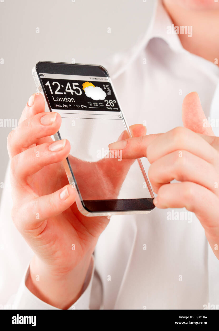 Futuristic Smart phone (phablet) with a transparent display in human ...