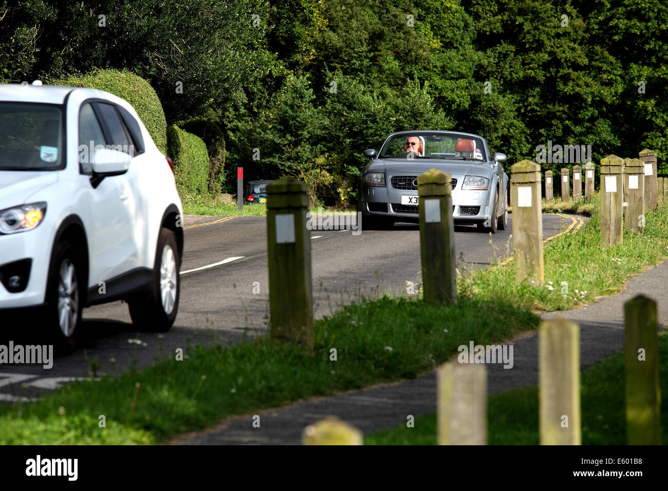 Cars on a british road hi-res stock photography and images - Alamy