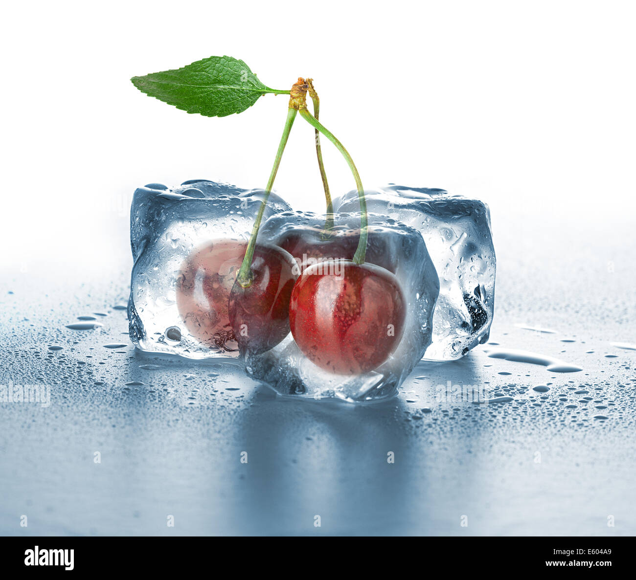 ice cubes and sweet cherry on white background Stock Photo - Alamy