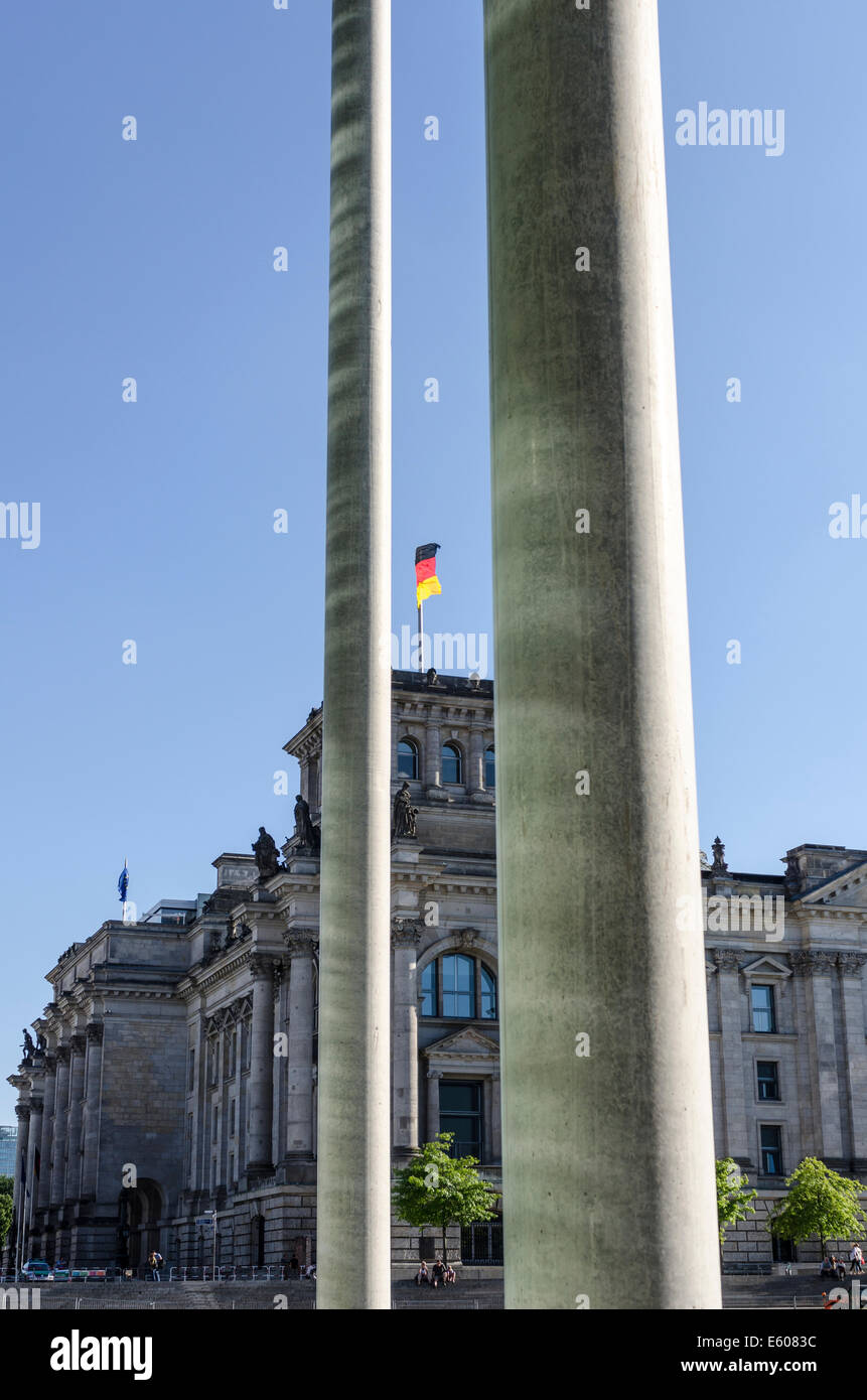 German Parliament, the Reichstag, partially visible behind columns of ...
