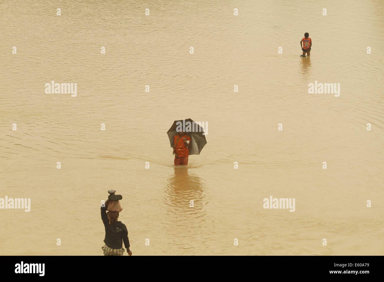 Villagers wade hi-res stock photography and images - Alamy