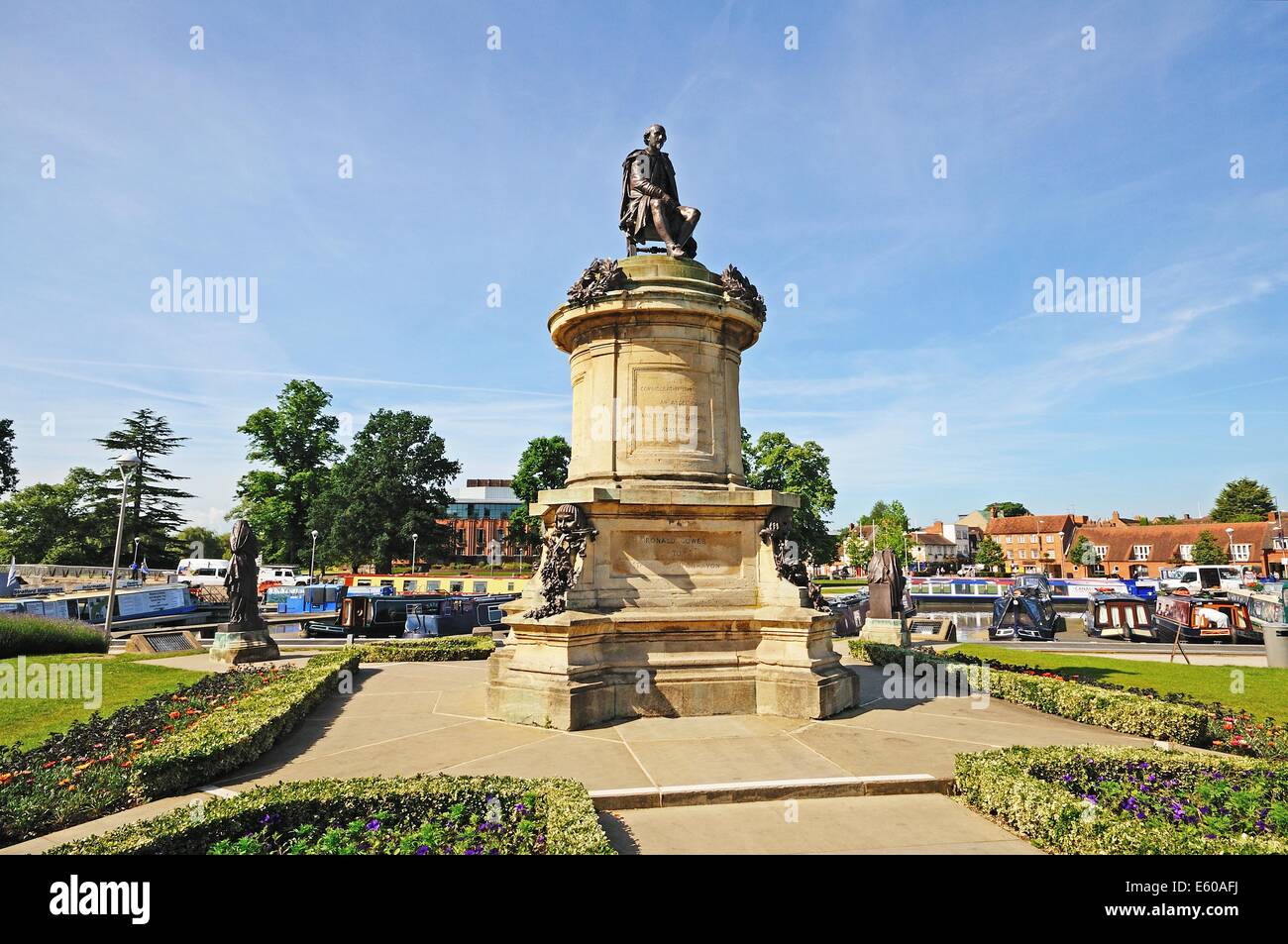 Statue of William Shakespeare sitting on top of the Gower Memorial with ...
