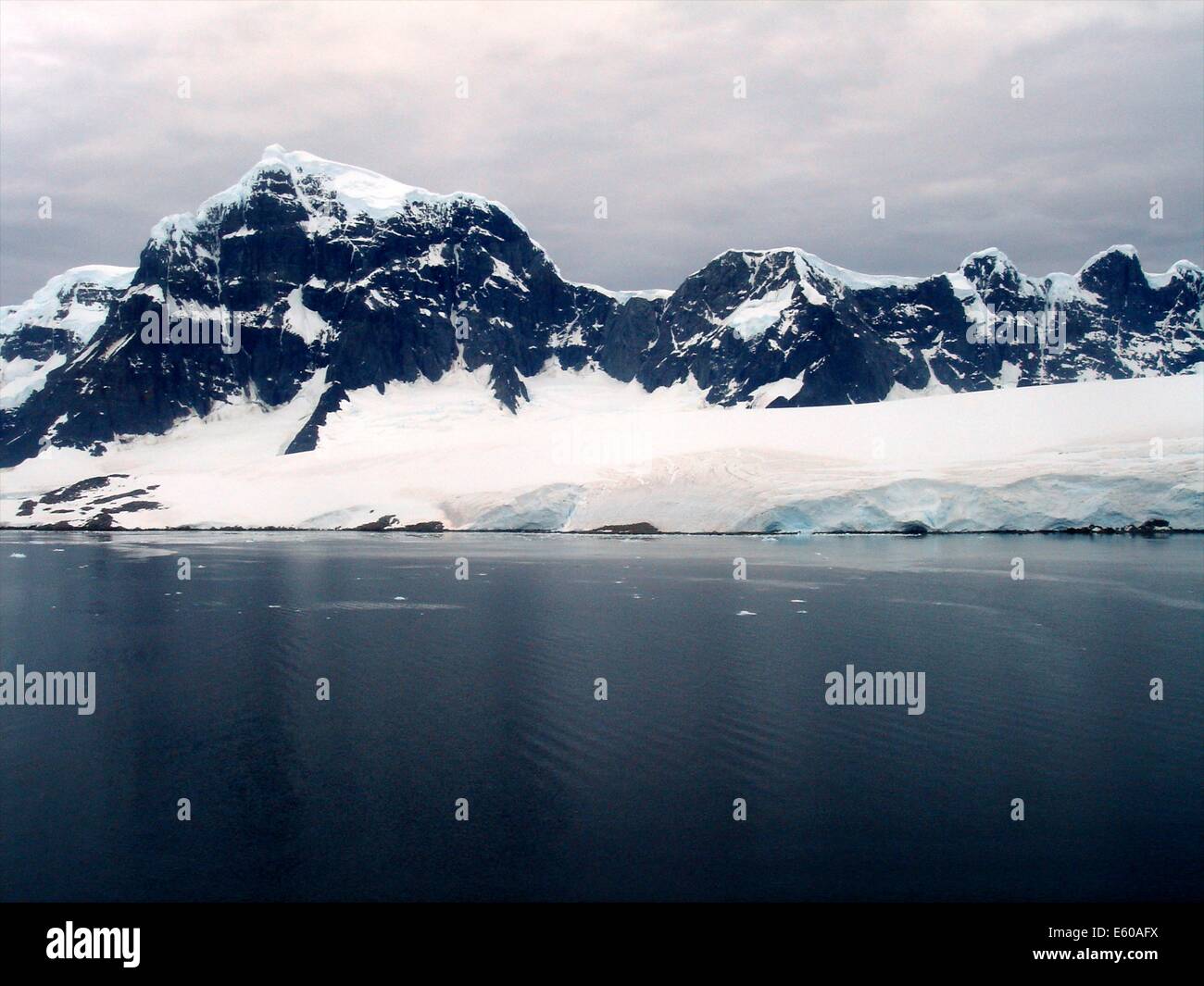 Reflection across the waters on the Antarctic Peninsula, near Port ...