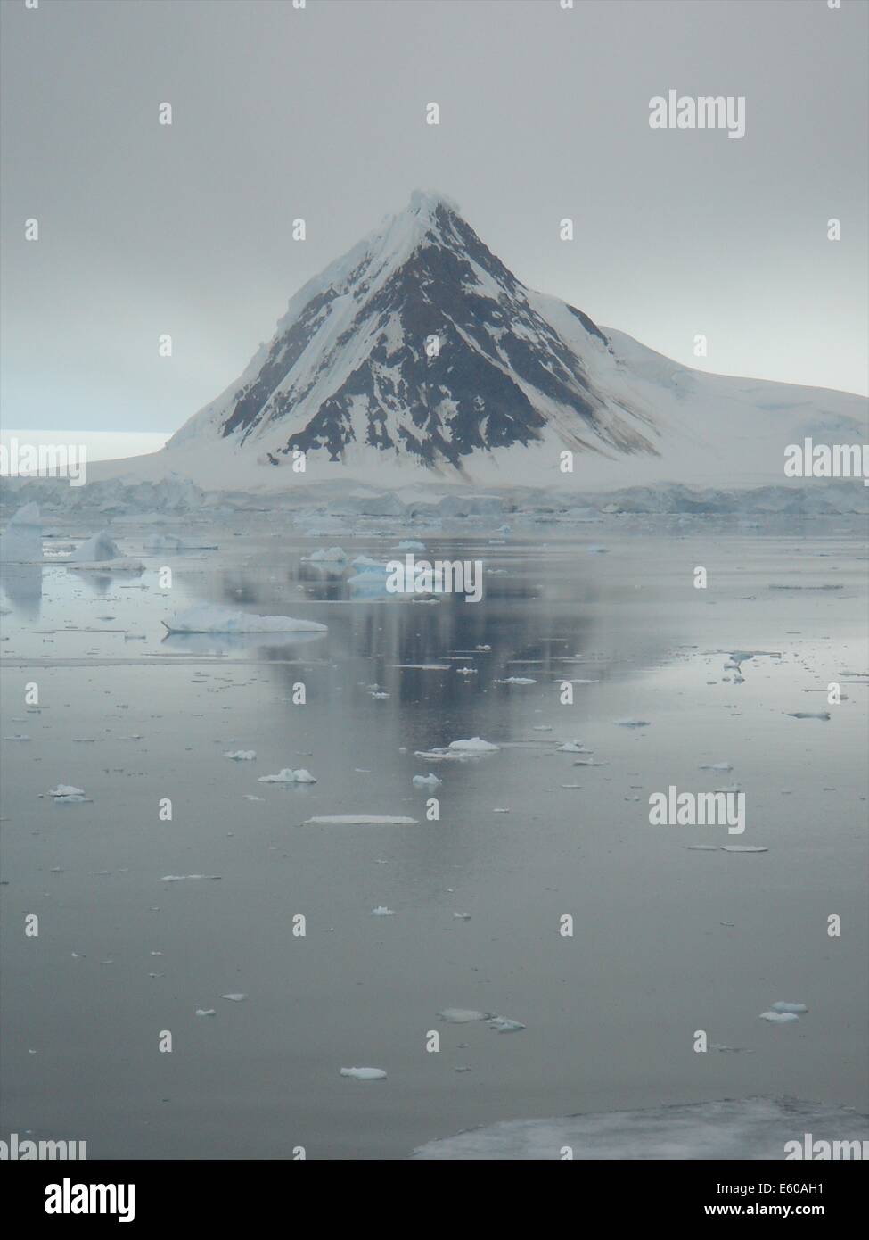Reflection across the waters on the Antarctic Peninsula, near Port ...