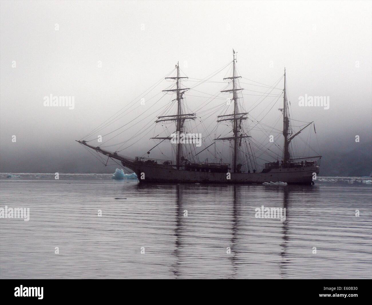 An old-fashioned Schooner style-ship sits anchored in Port Lockroy ...