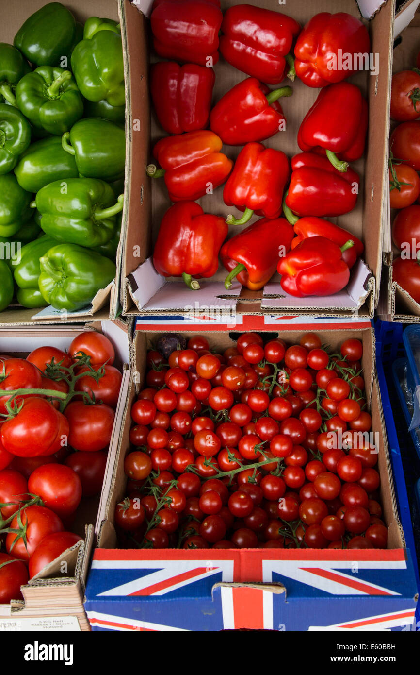 Fruit and vegetables for sale at a local greengrocer's stall; tomatoes ...