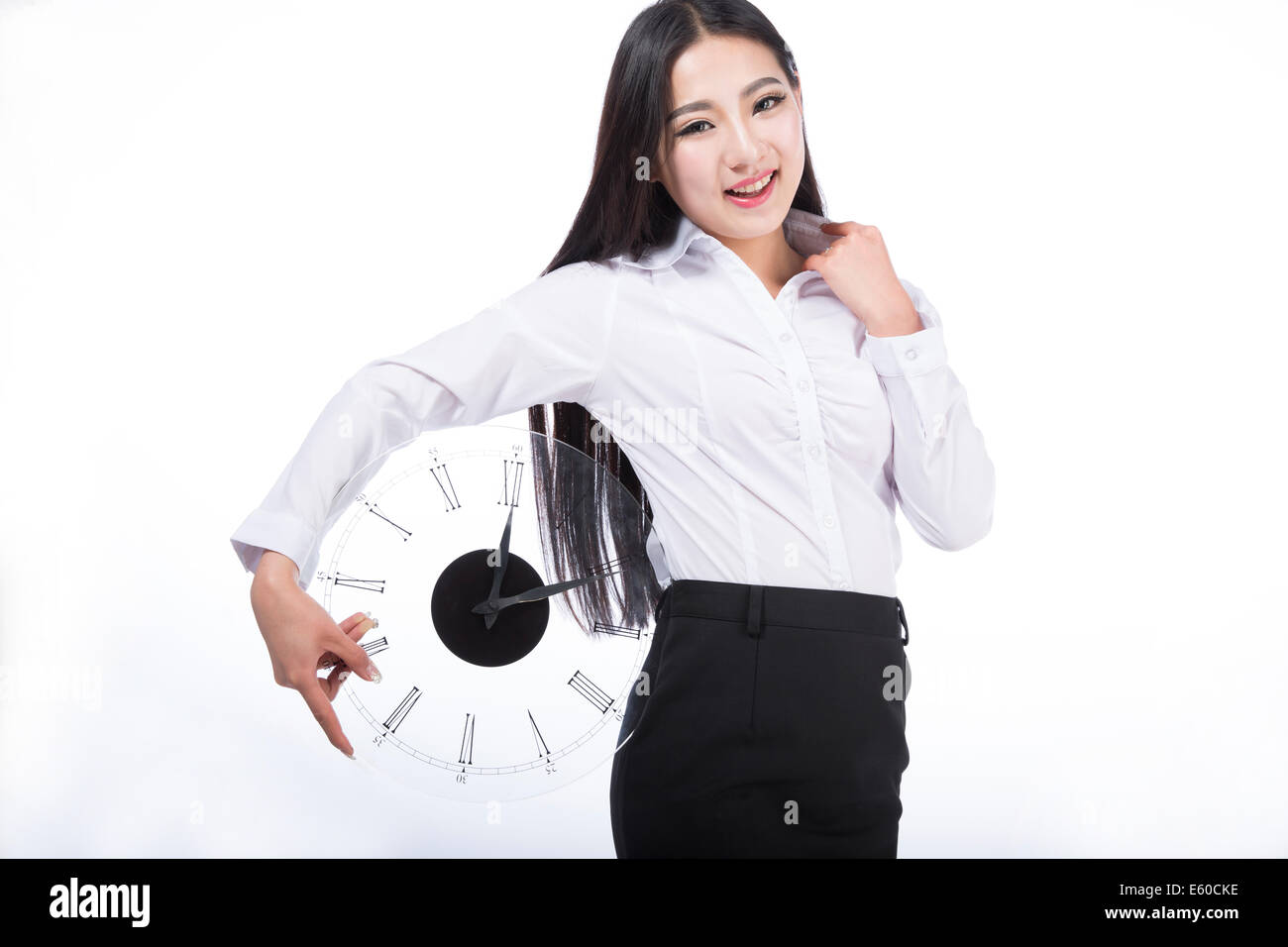 woman holding clock on white background. time management concept Stock ...