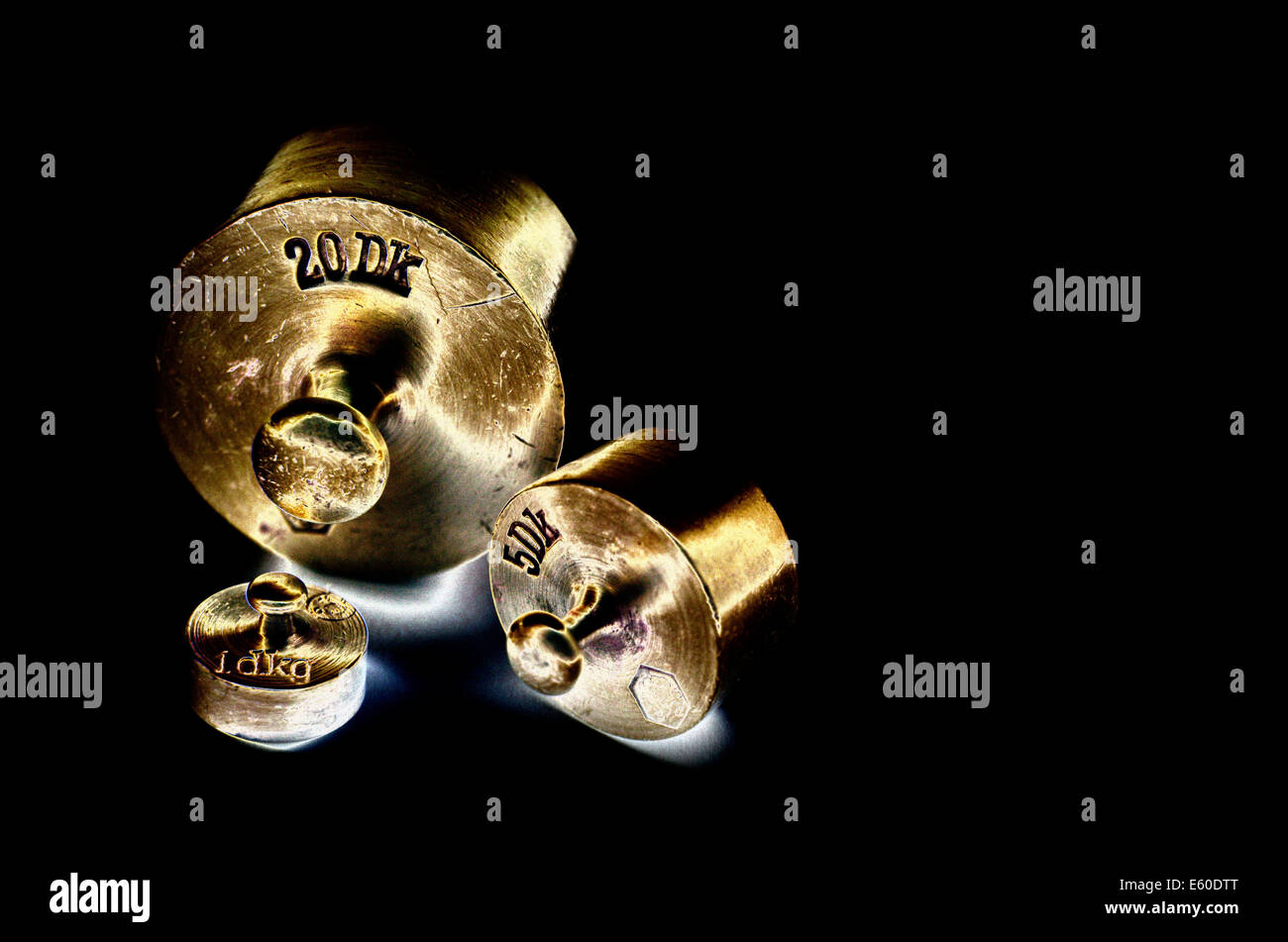 Old-Style Gold Weight Isolated on Black Background Stock Photo - Alamy