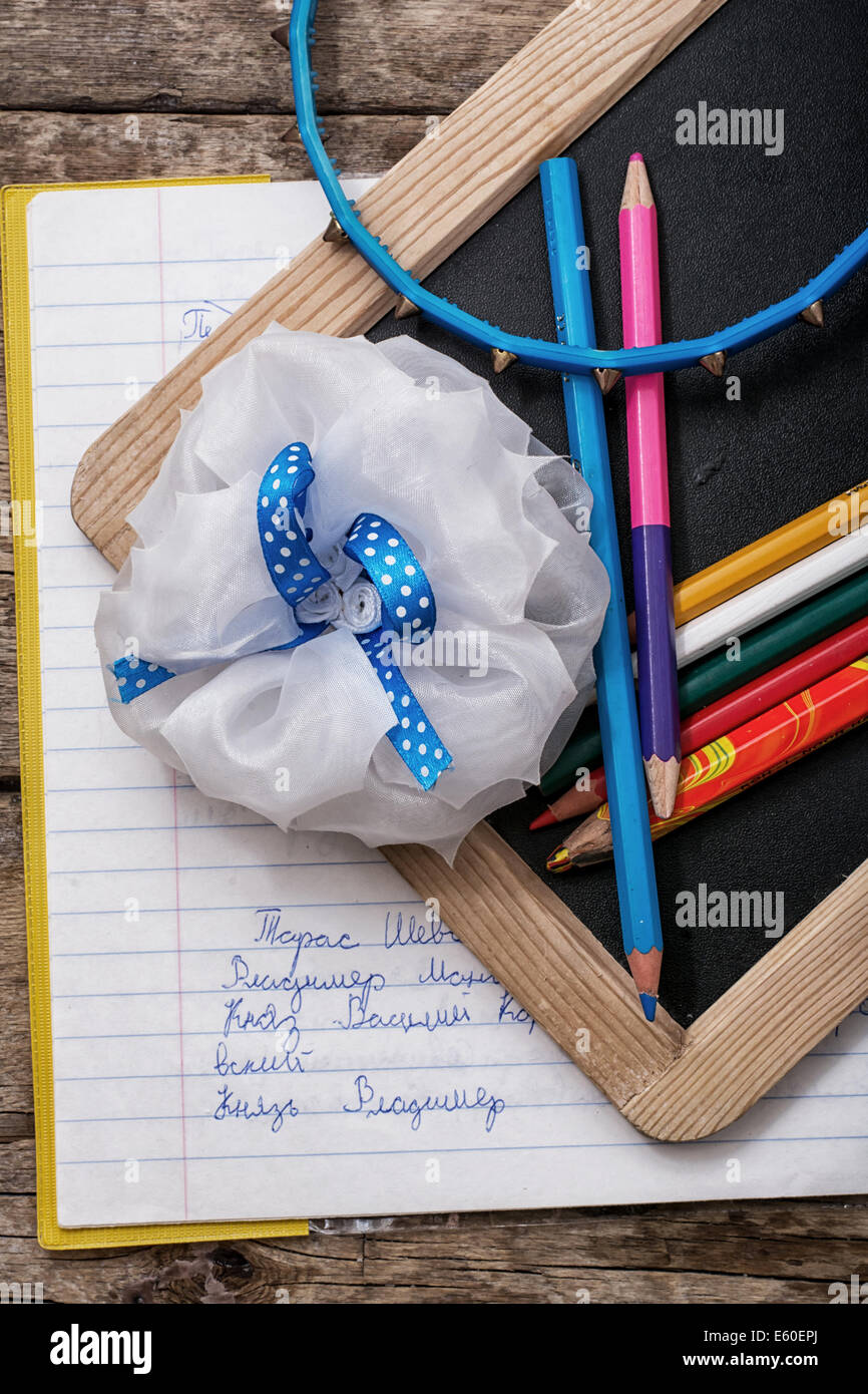 notebook,pencil,bow schoolgirl first year pupil Stock Photo - Alamy