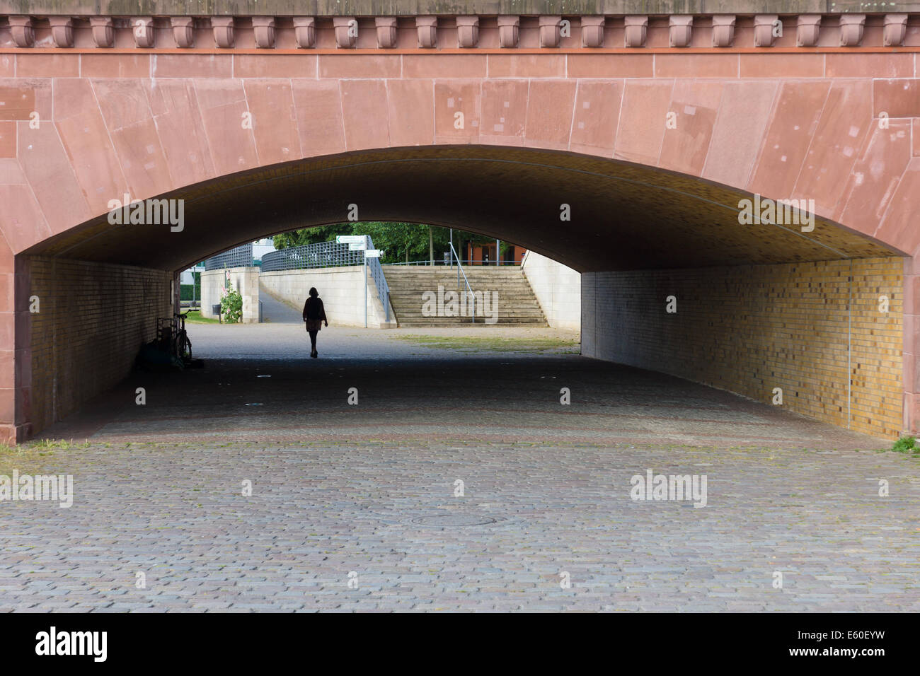 Pedestrian under the bridge Stock Photo - Alamy