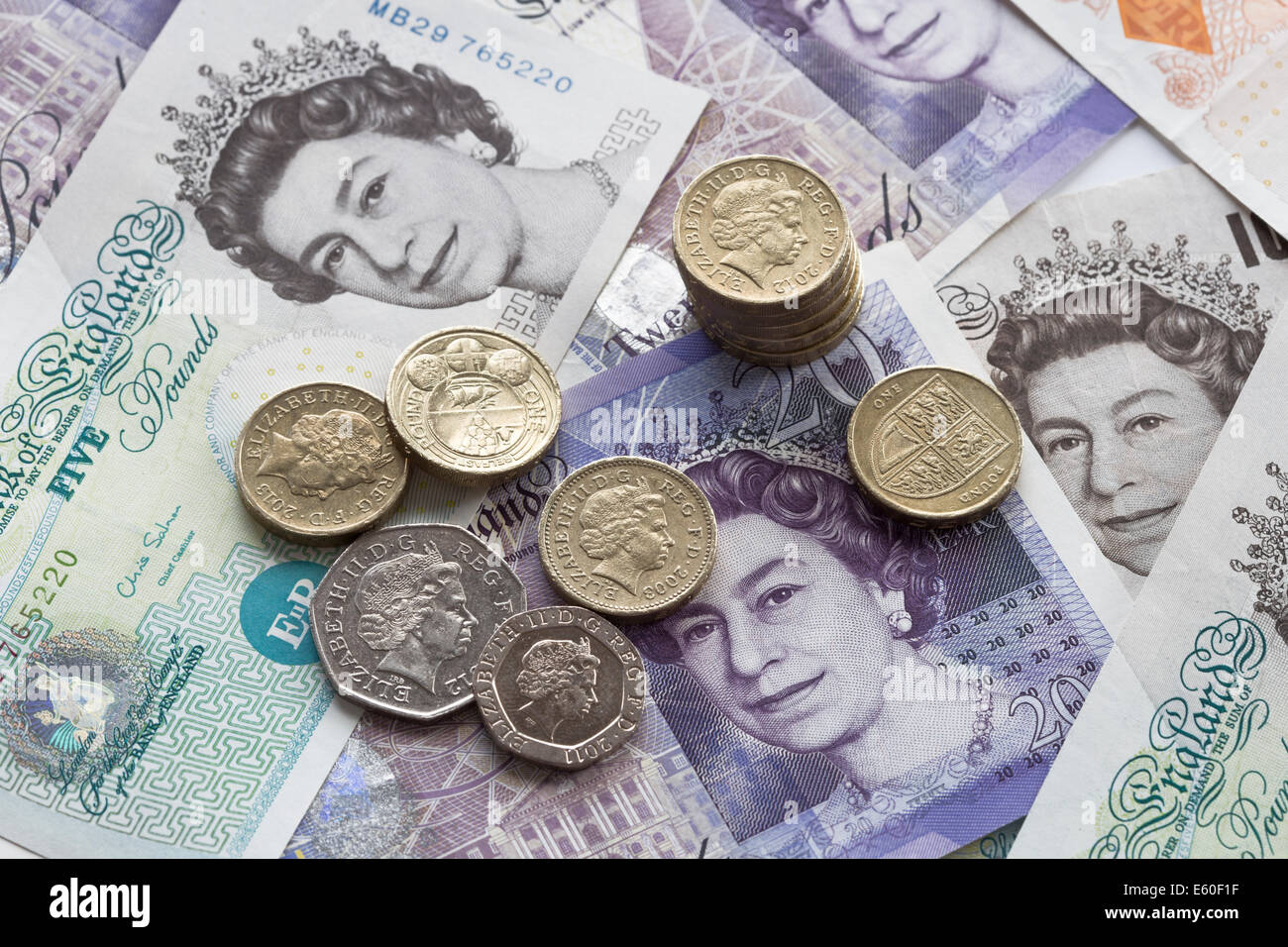 loose change on top British sterling cash notes Stock Photo - Alamy