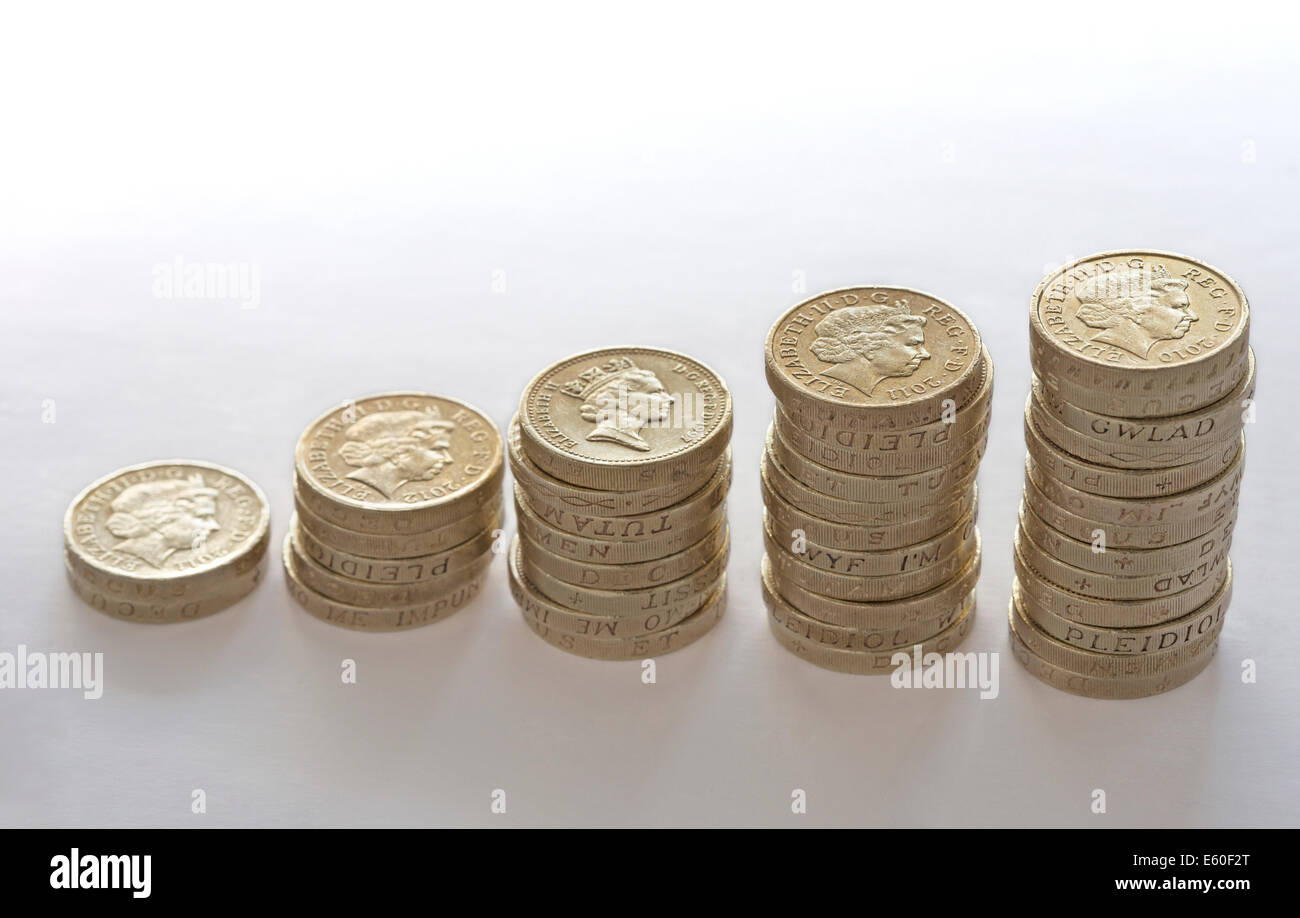 ascending stacks of British pound coins on white background Stock Photo ...