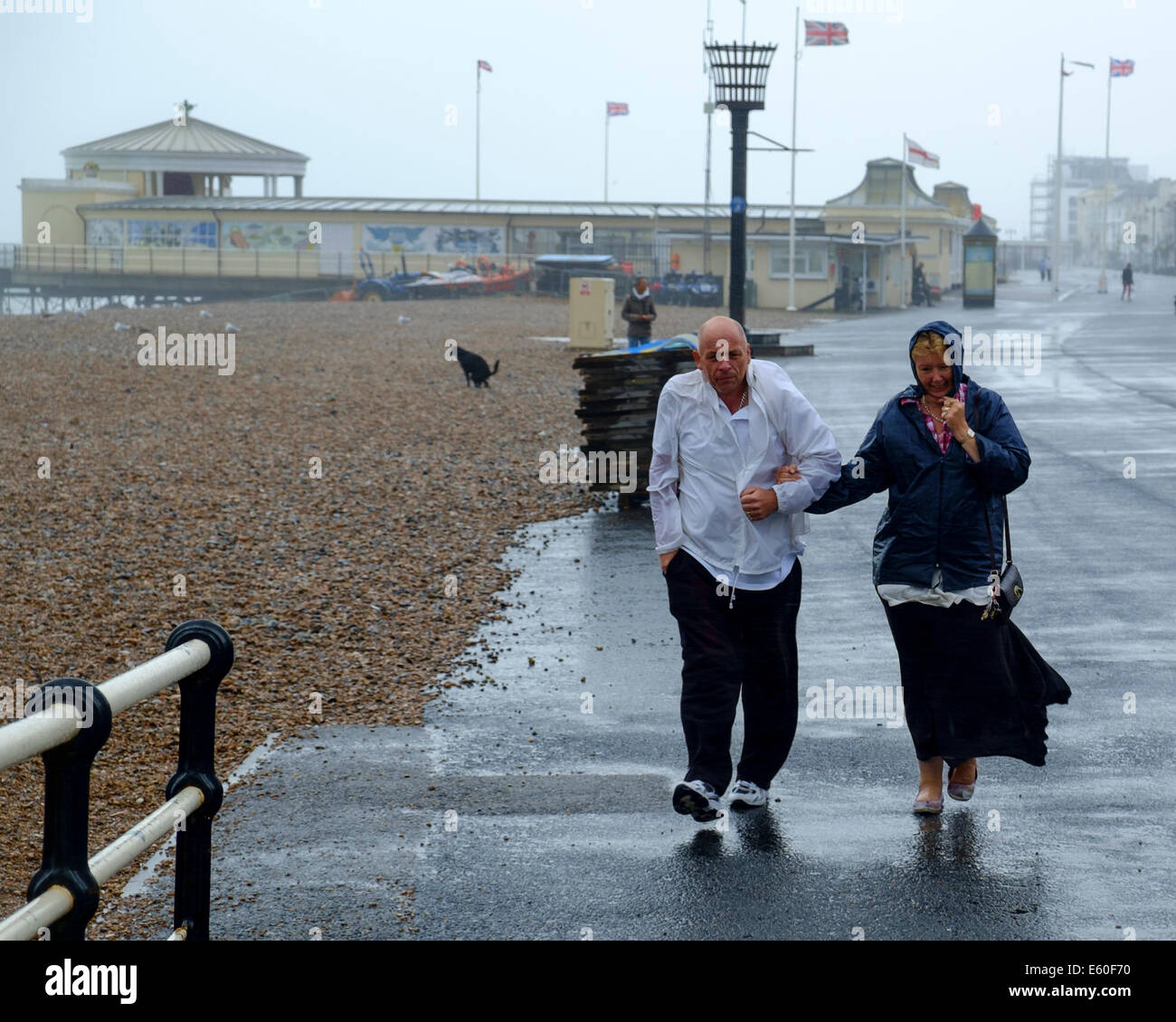 Walking in high winds hi-res stock photography and images - Alamy