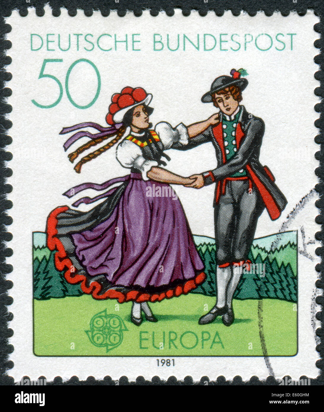 Postage stamp printed in Germany, shows South German couple dancing in ...