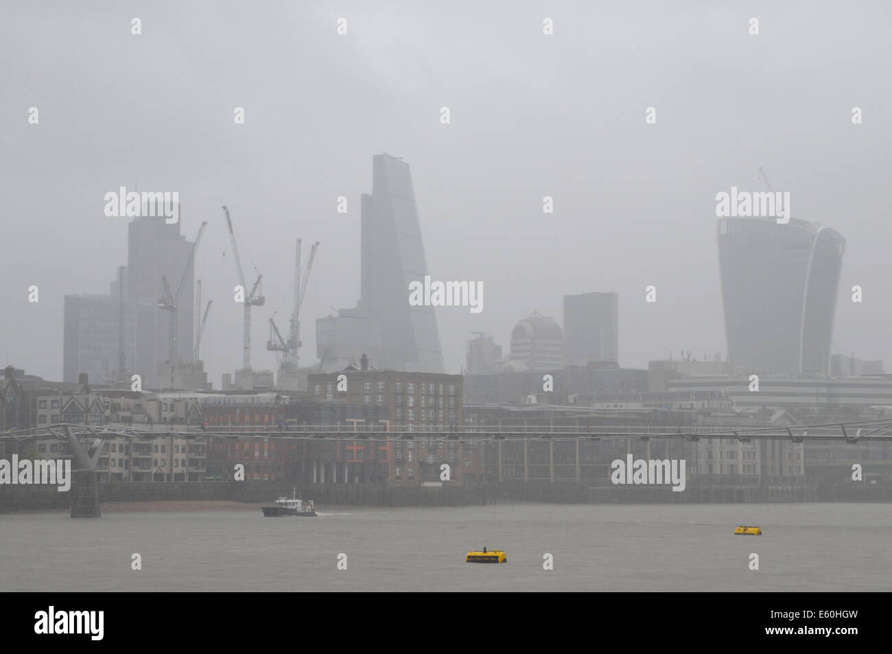 London, UK, 10th August 2014. The Millenium Bridge over the Thames with ...
