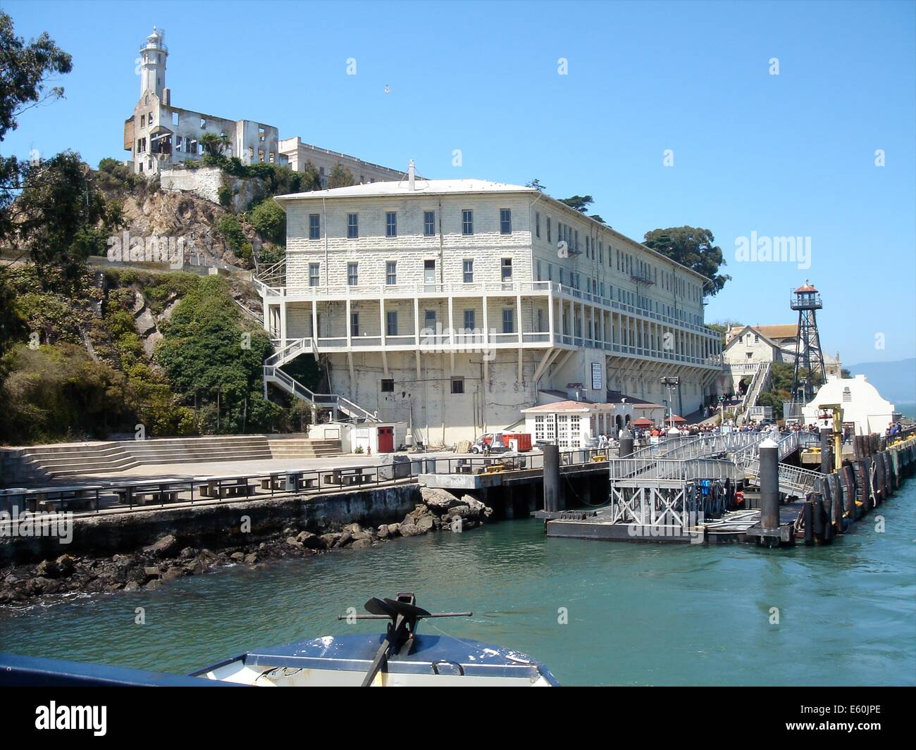 The dock and Building 64 at Alcatraz Island, with the lighthouse and ...