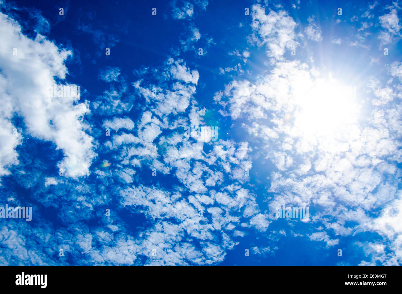 sunlight in blue sky Stock Photo - Alamy