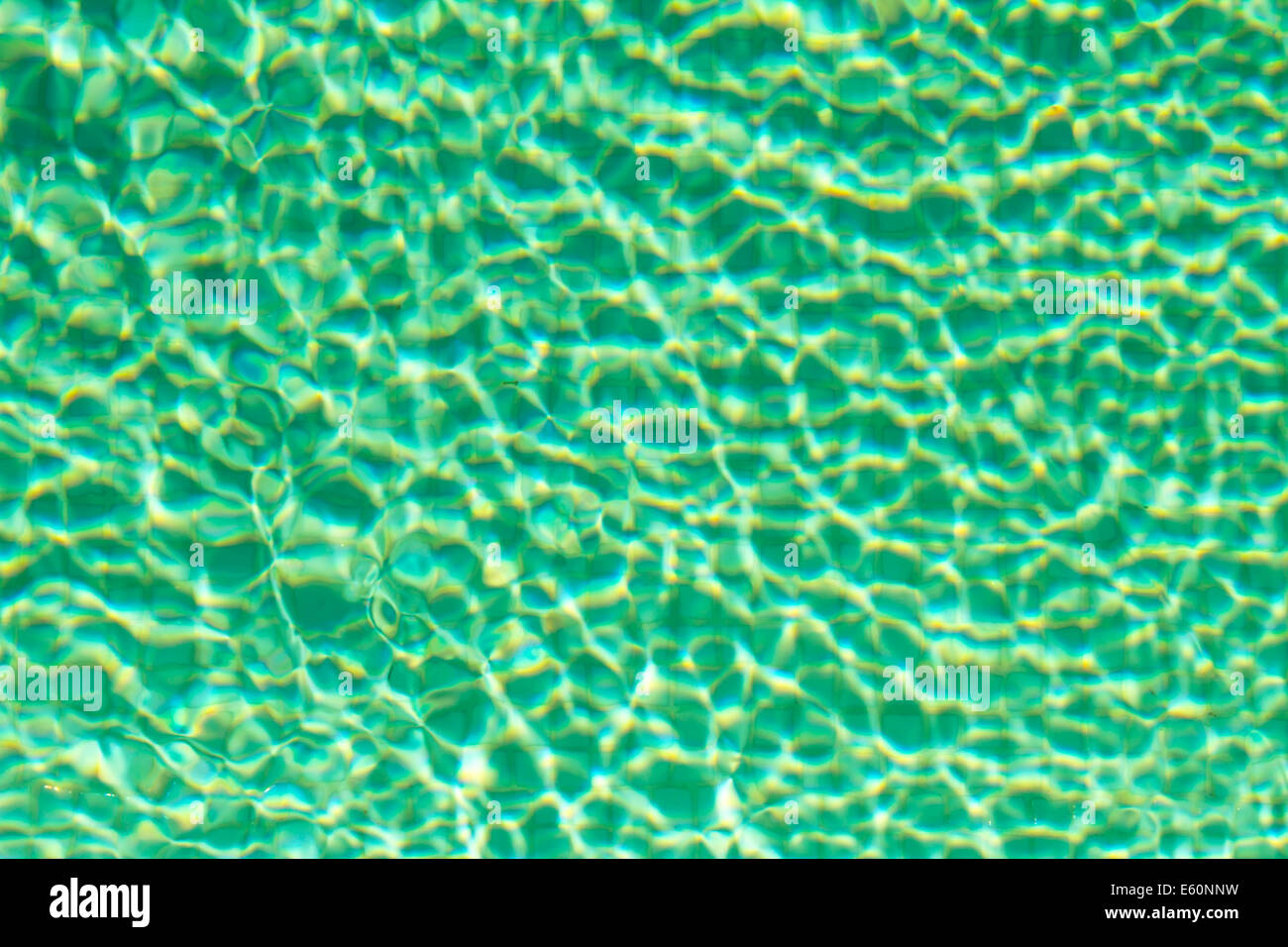 Water on a tiled swimming pool background Stock Photo - Alamy