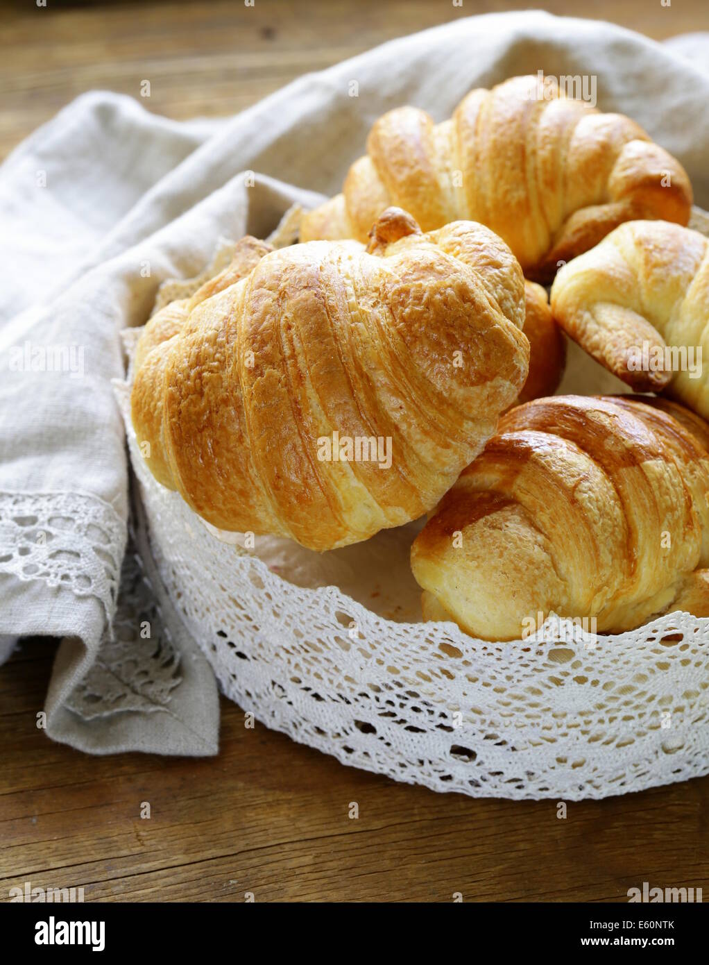 traditional French baking puff pastry croissants in lacy basket Stock ...