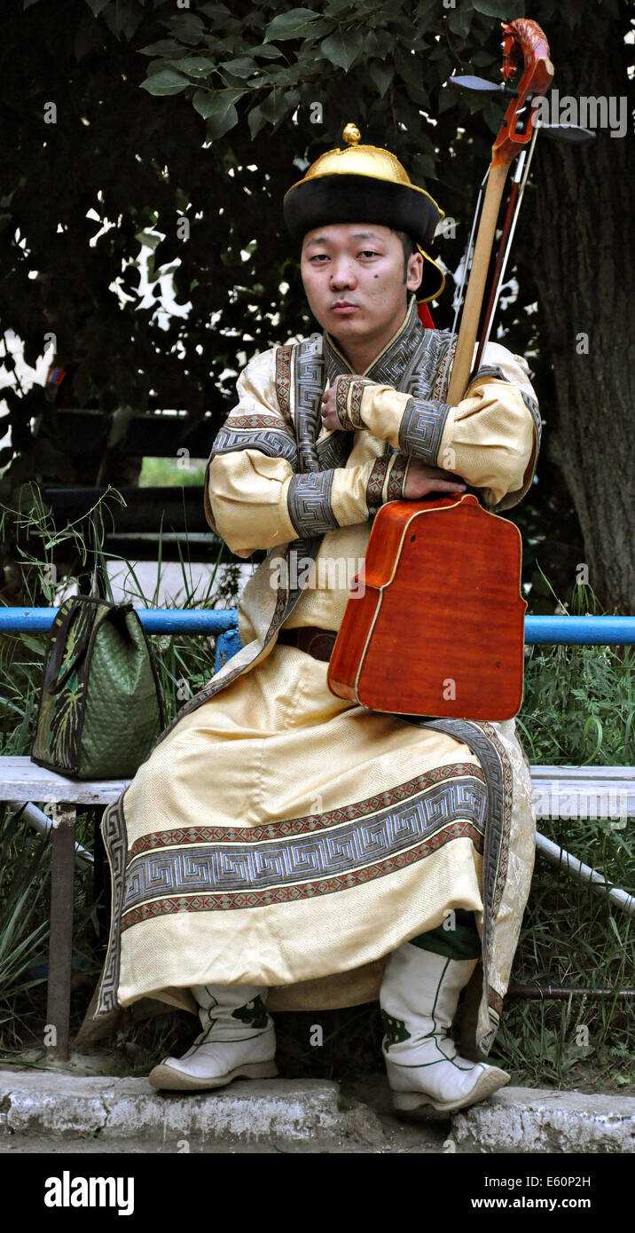 A traditional Mongolian musician waits for the Pacific Angel Opening ...
