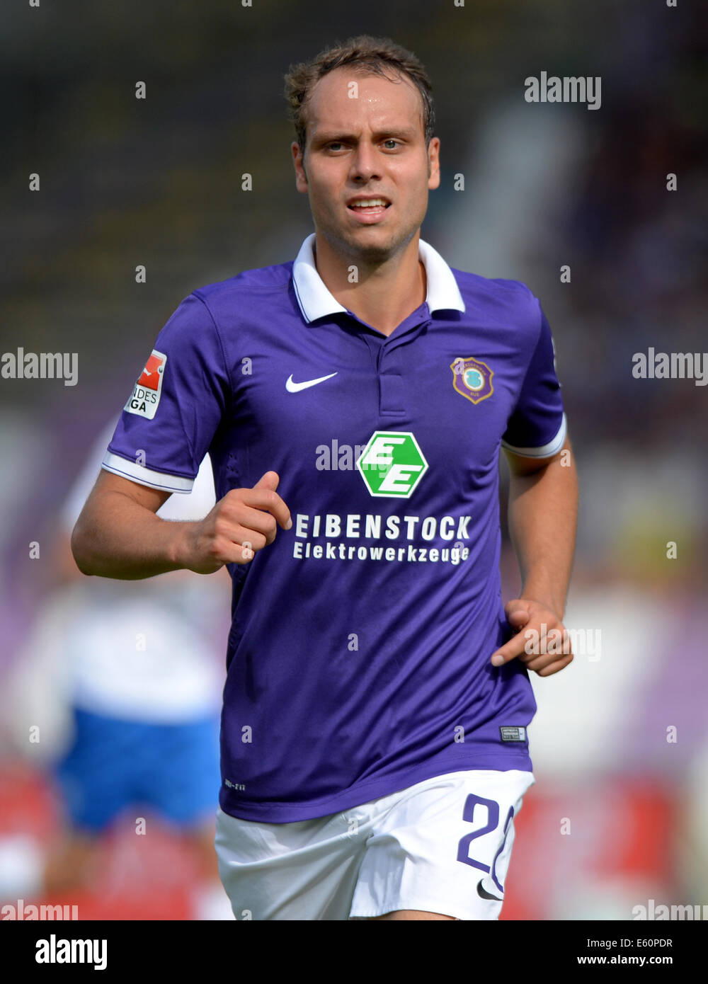 Aue, Germany. 09th Aug, 2014. Aue's Rico Benatelli during the German ...